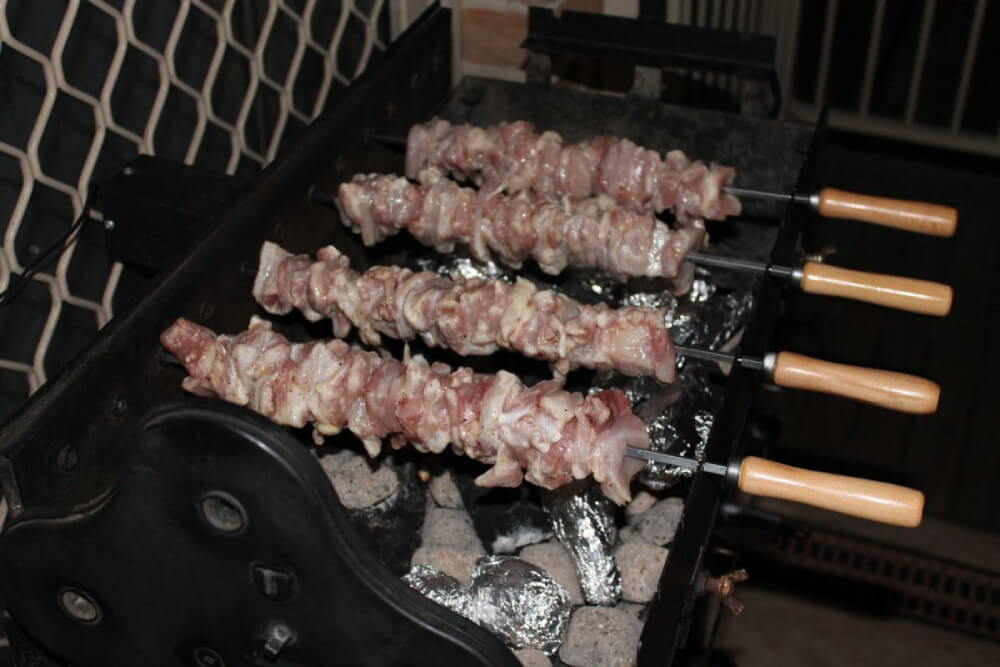 Using a Cyprus Spit Roaster for cooking